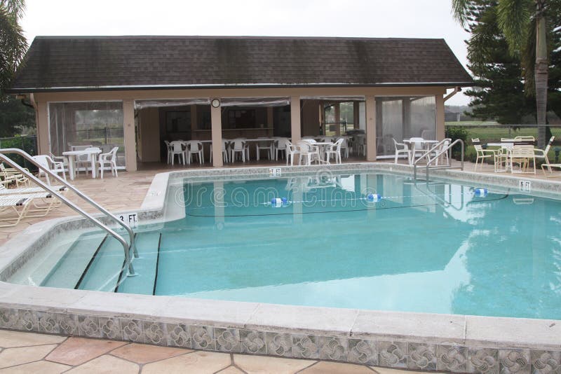 Community Pool House and Pool Stock Photo - Image of holiday, tables ...