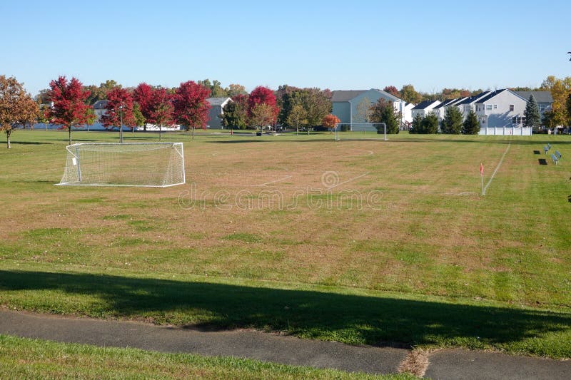 Community Soccer Field in the Fall with Goals Trees with Leaves ...