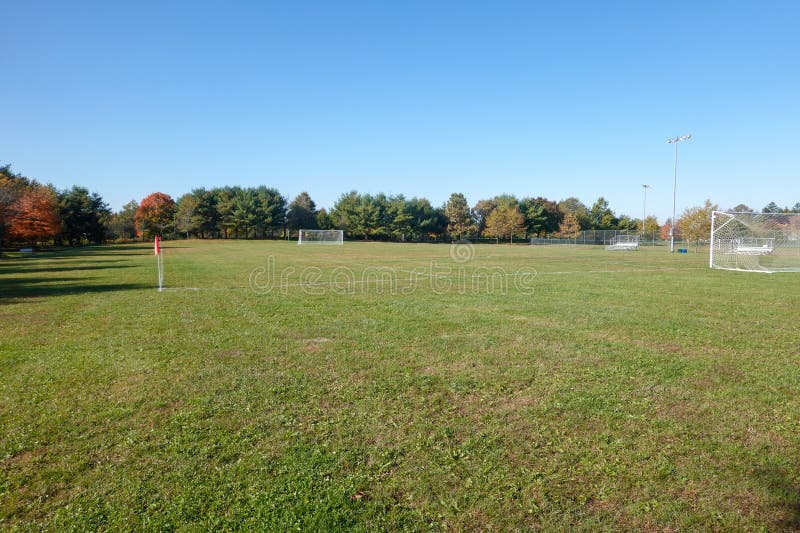 Community Soccer Field in the Fall with Goals Trees with Leaves ...