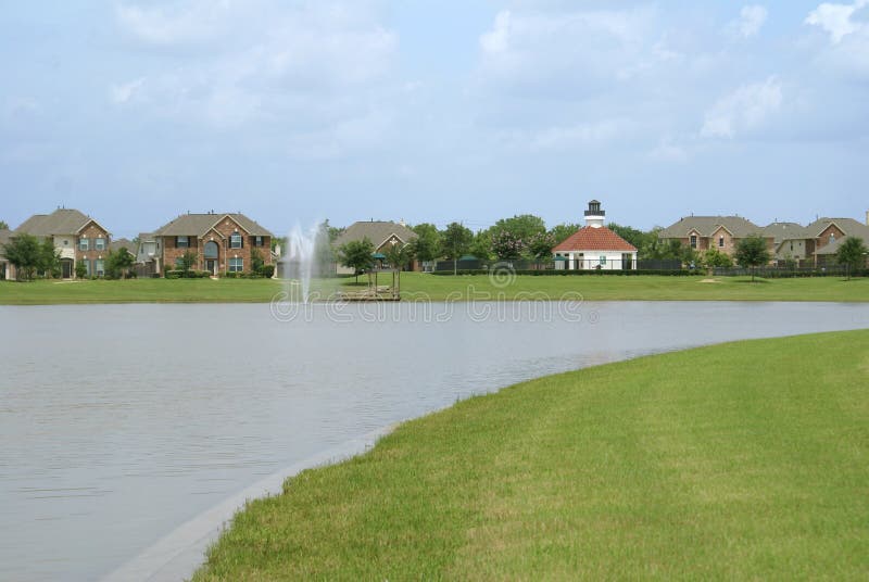Community subdivision lake stock photo. Image of neighborhood - 4283196