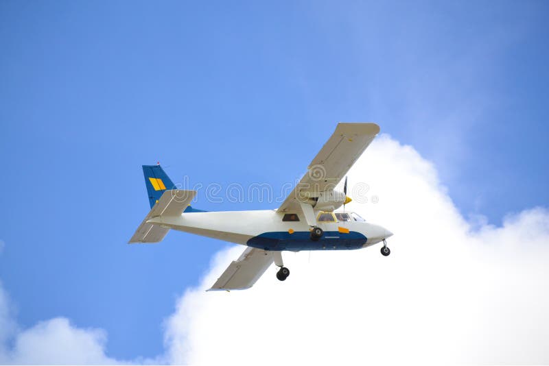 Commuter Airplane Carrying People during Takeoff Stock Image - Image of ...