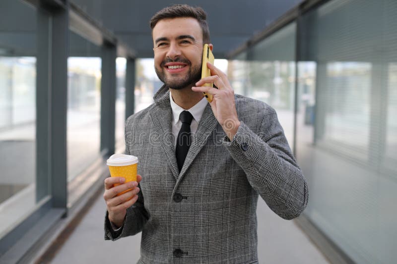 Commuter Making a Phone Call while Drinking Coffee Stock Image - Image ...