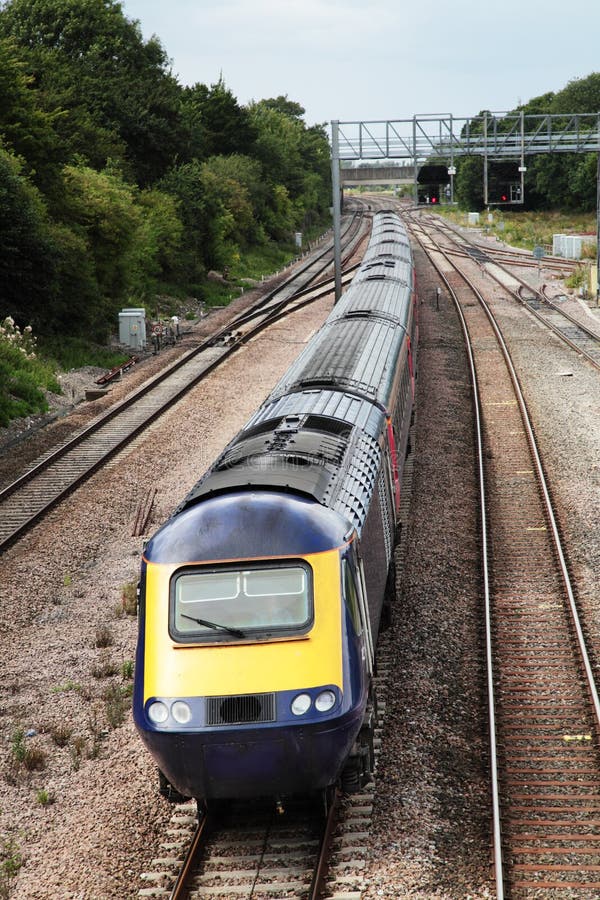 Commuter Train Passing Signals Stock Image - Image of commuter, train ...