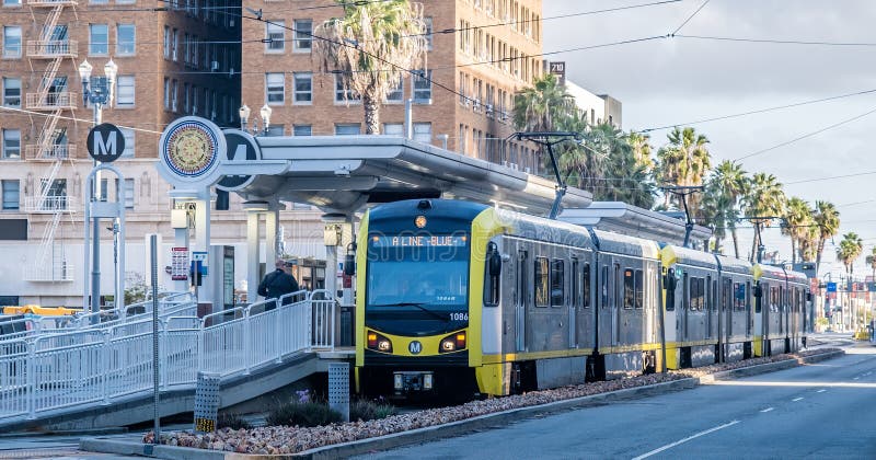 Commuter Train Pulling into Station Editorial Photo - Image of downtown ...