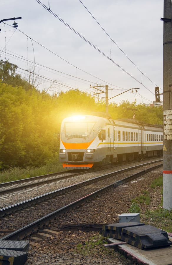 Green commuter train stock image. Image of bridge, carriage - 13716201