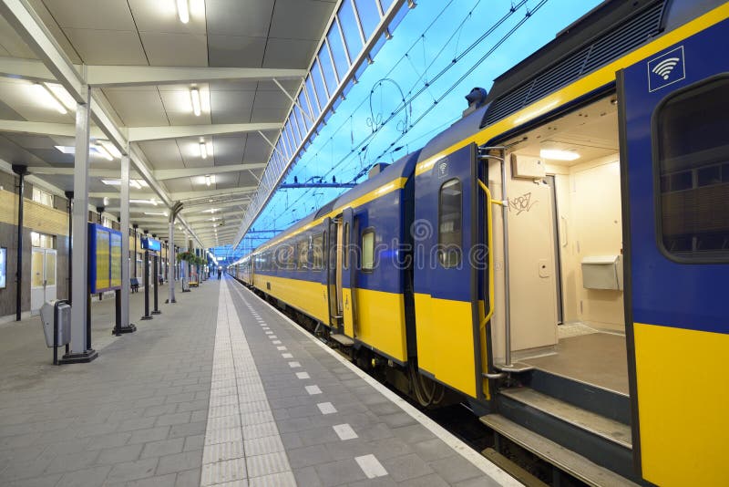 Commuter Train on a Station Editorial Photo - Image of vehicle, venlo ...