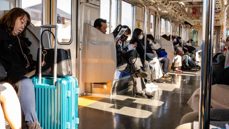Commuters in a train editorial stock photo. Image of women - 39116628