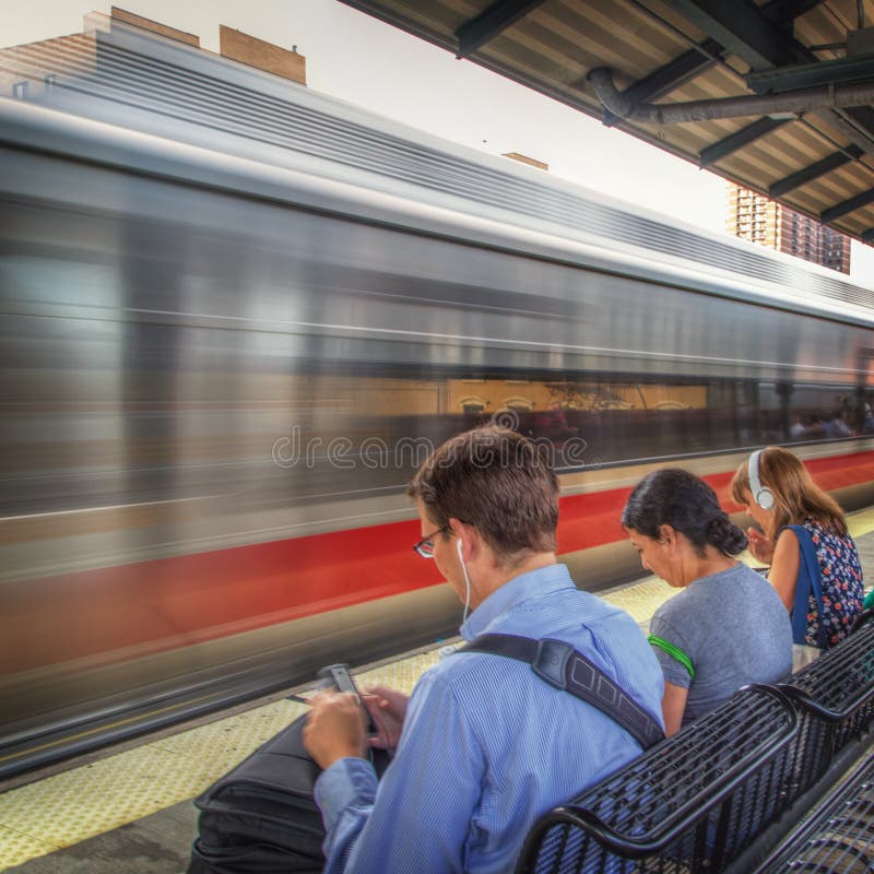 Commuters wait for a train editorial stock photo. Image of worker ...
