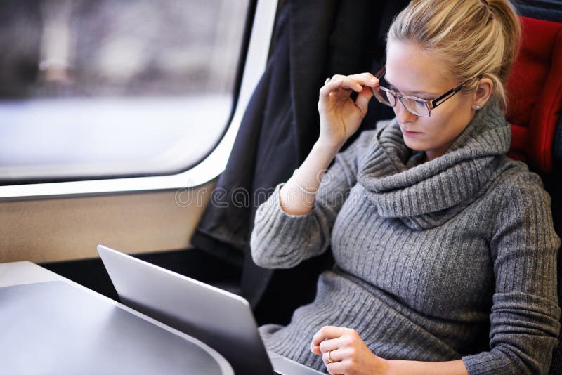 Commuting Work. an Attractive Young Woman Traveling by Train. Stock ...