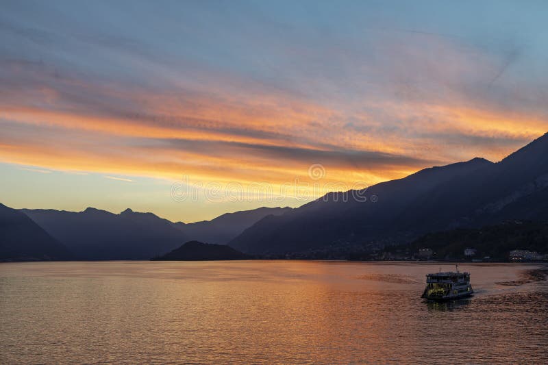 Como Ferry at Sunset Approaching Bellagio Stock Photo - Image of como ...
