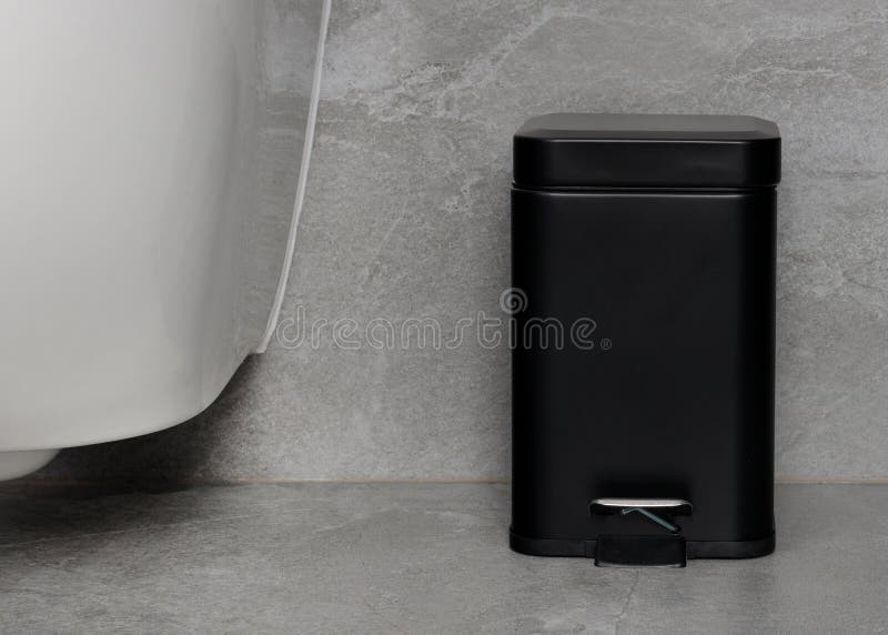 Compact Black Pedal Trash Bin in Minimalist Bathroom Stock Photo ...