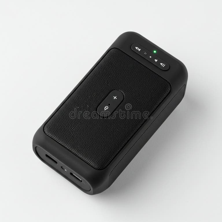 Compact Black Portable Speaker with a Rectangular Shape and Rounded ...