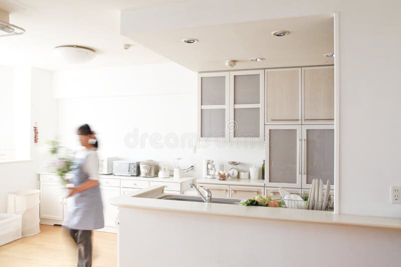 A Bright, Clean White Kitchen with a Compact Stock Photo - Image of ...