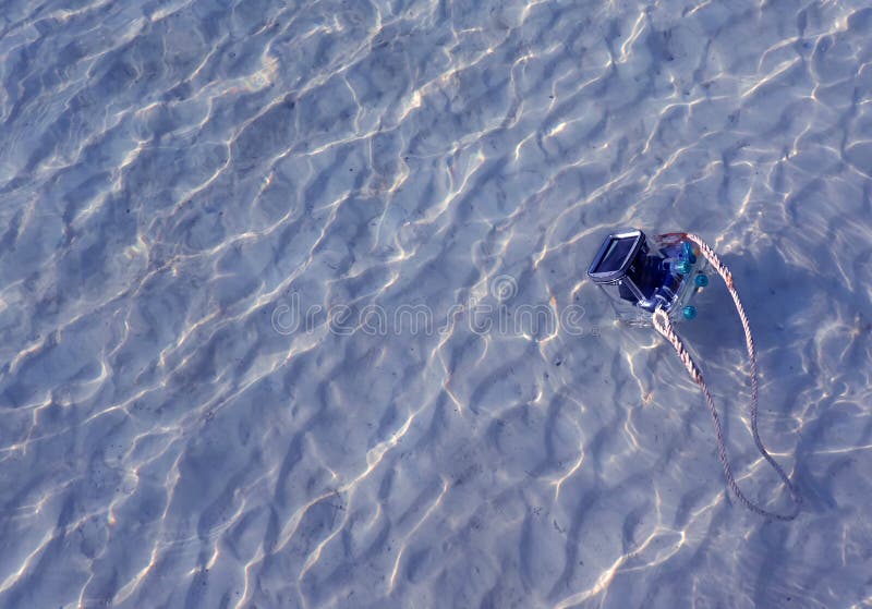 Compact Camera and Housing Floating on the Sea. Stock Photo - Image of ...
