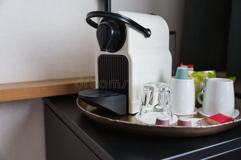 Compact Coffee Machine with Cups and Pods Stock Photo - Image of ...