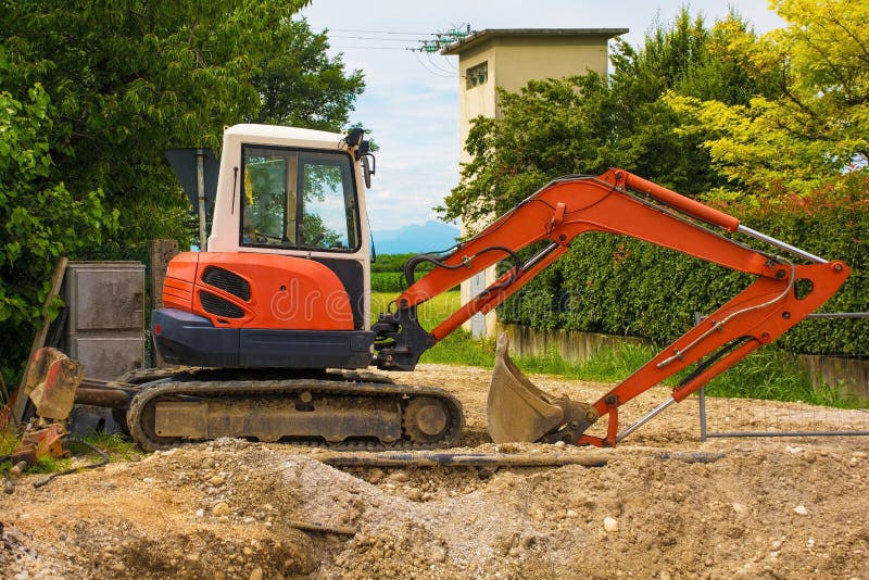 Compact Crawler Excavator stock photo. Image of heavyduty - 193405454