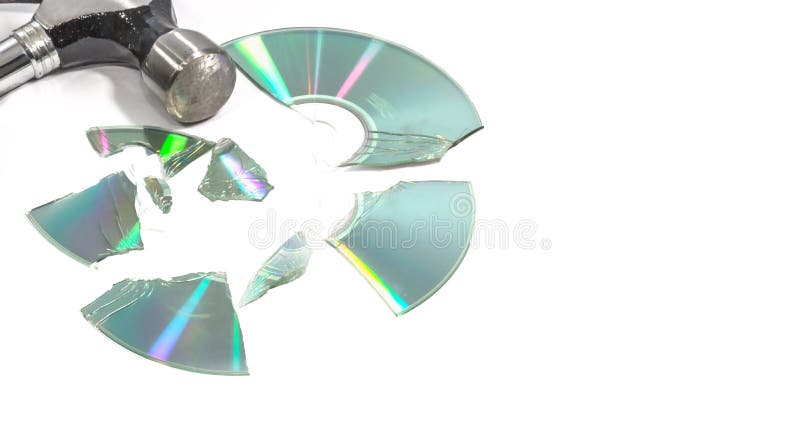 Compact-disc (Cdes) Rotos Por Un Martillo Imagen de archivo - Imagen de ...