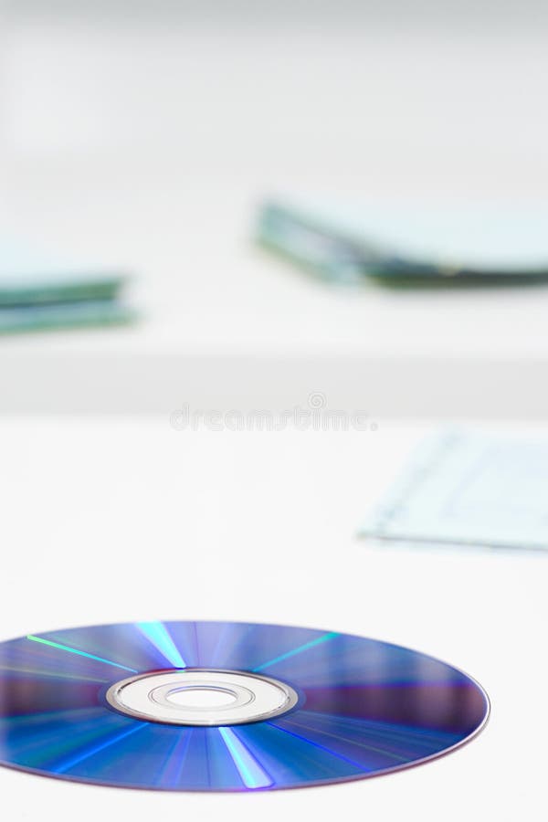 Compact disc on desk stock photo. Image of information - 62560194