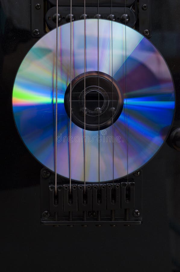 Compact disc and guitar stock photo. Image of sing, learning - 65083564