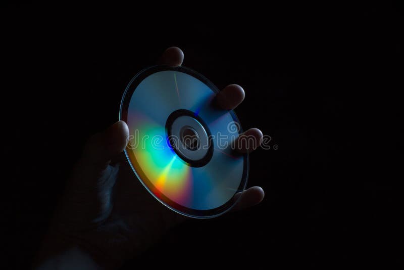Compact-disc in hand stock image. Image of circle, burn - 201353867