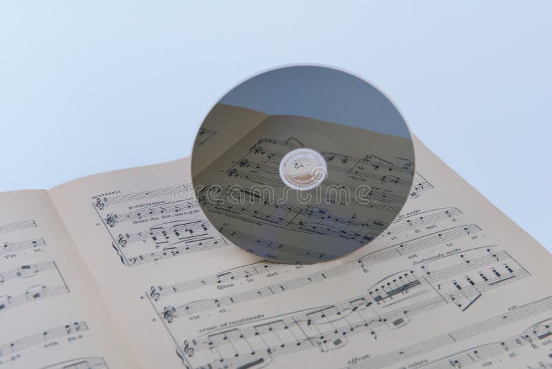 Compact disc stock image. Image of hand, angle, notes - 56918653
