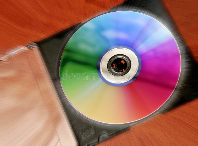 Compact disc on the table stock photo. Image of media - 4788482