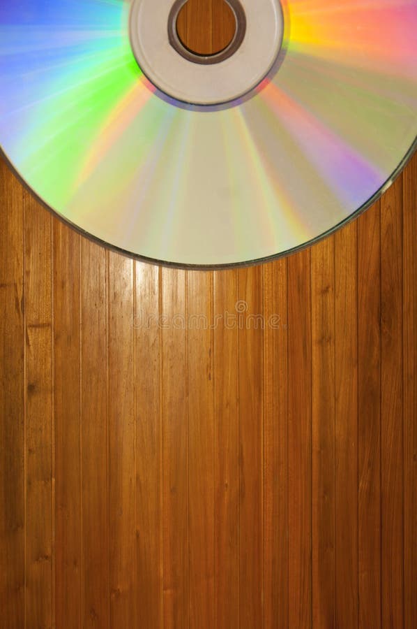 Compact Disc on a Wooden Table Stock Photo - Image of disk, burn: 46385068