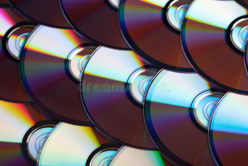 Compact Discs Background. Several Cd Dvd Blu-ray Discs. Optical ...