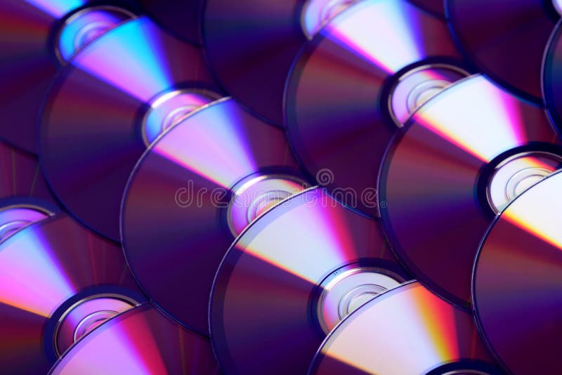 Compact Discs Background. Several Cd Dvd Blu-ray Discs. Optical ...
