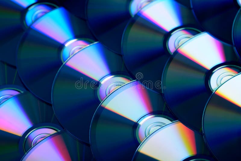 Compact Discs Background. Several Cd Dvd Blu-ray Discs. Optical ...