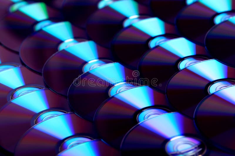 Compact Discs Background. Several Cd Dvd Blu-ray Discs. Optical ...