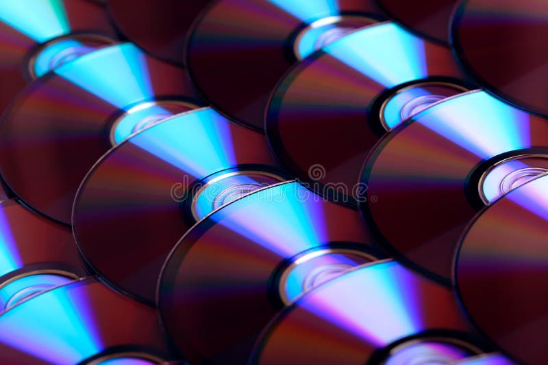 Compact Discs Background. Several Cd Dvd Blu-ray Discs. Optical ...