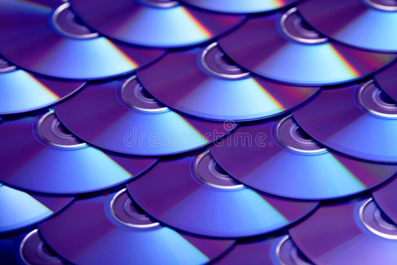 Compact Discs Background. Several Cd Dvd Blu-ray Discs. Optical ...
