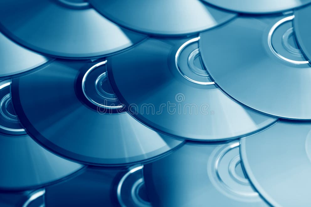 Compact Discs Background. Several Cd Dvd Blu-ray Discs. Optical ...