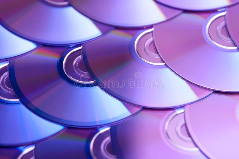 Compact Discs Background. Several Cd Dvd Blu-ray Discs. Optical ...