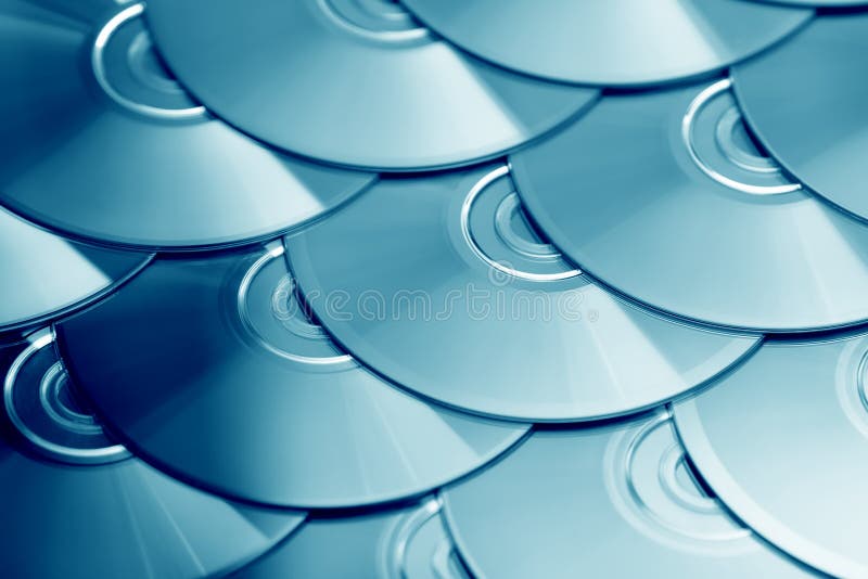 Compact Discs Background. Several Cd Dvd Blu-ray Discs. Optical ...