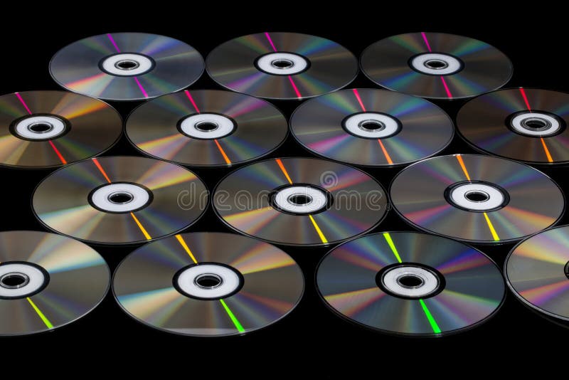 Compact Discs on a Black Background with Color Reflection Stock Image ...