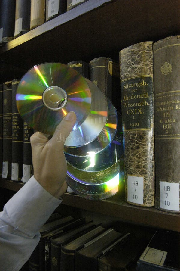 Compact Disk or Dvd in the Library Stock Image - Image of library ...