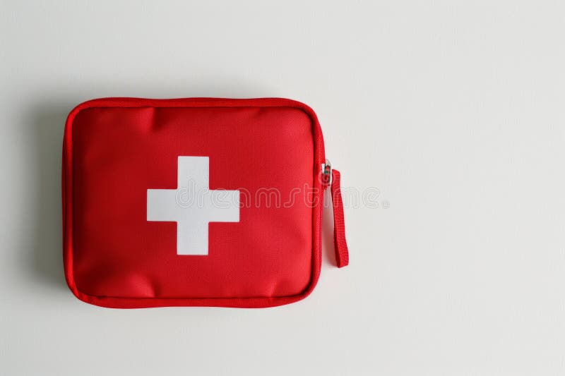 Compact First Aid Kit with a White Cross Symbol on a White Background ...