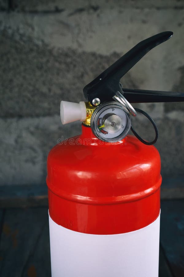 Compact Red Fire Extinguisher for Auto or Home on Grey Background. for ...