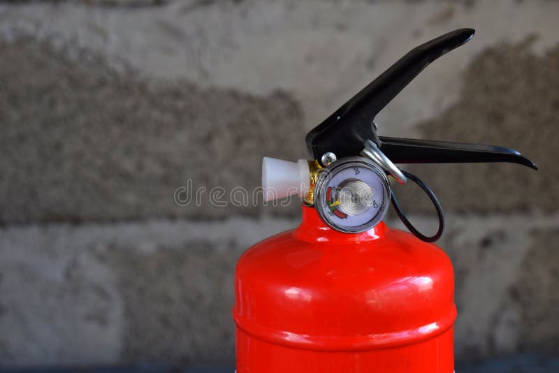 Compact Red Fire Extinguisher for Auto or Home on Grey Background. for ...
