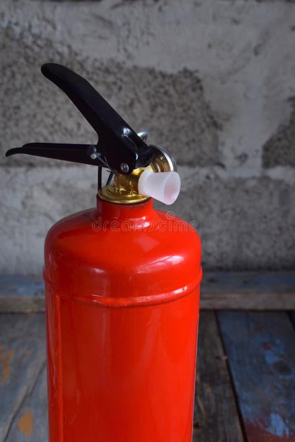Compact Red Fire Extinguisher for Auto or Home on Grey Background. for ...