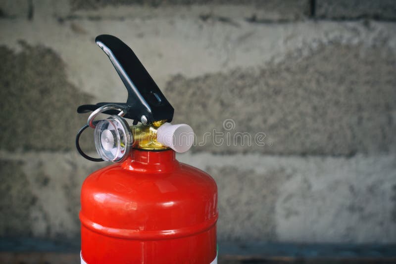 Compact Red Fire Extinguisher for Auto or Home on Grey Background. for ...