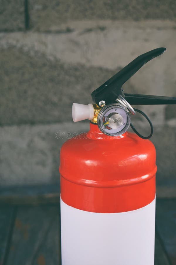 Compact Red Fire Extinguisher for Auto or Home on Grey Background. for ...
