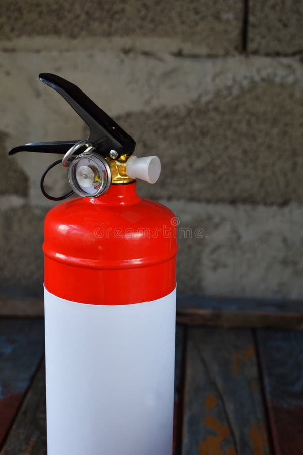 Compact Red Fire Extinguisher for Auto or Home on Grey Background. for ...