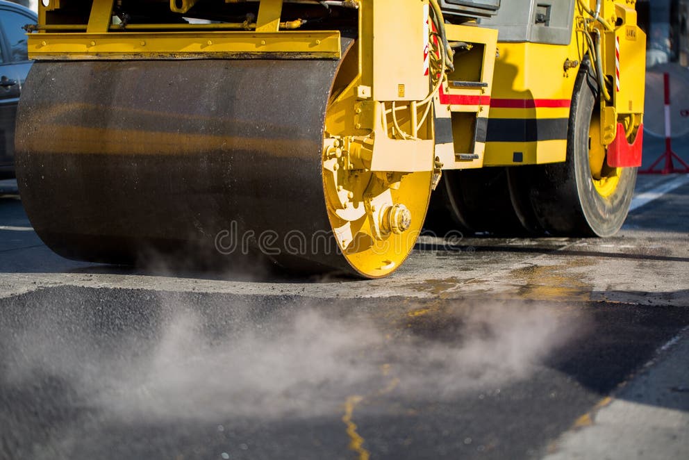 The Compact Steamroller Will Flatten the Asphalt during Repairs. Stock ...