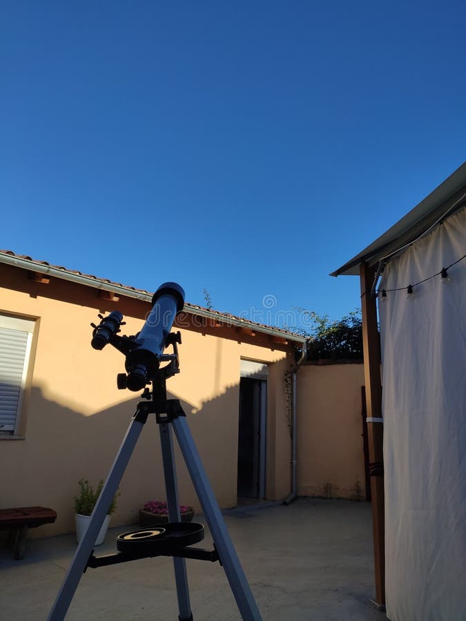 Small Telescope Set Up in a Garden Courtyard in Broad Daylight ...