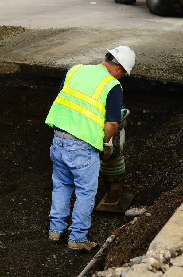 Compacting stock photo. Image of person, tool, dirty - 21208854