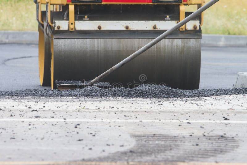 Compacting Asphault stock photo. Image of construction - 42660118
