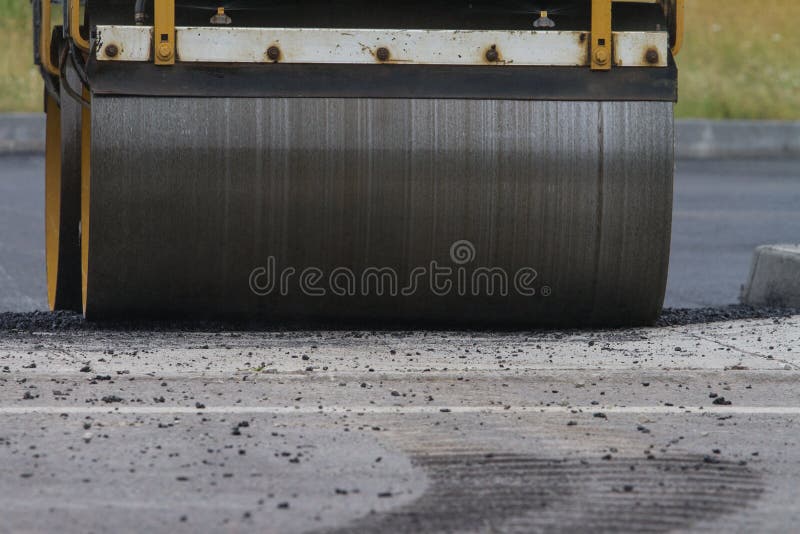 Compacting Asphault stock image. Image of highways, concrete - 42660127
